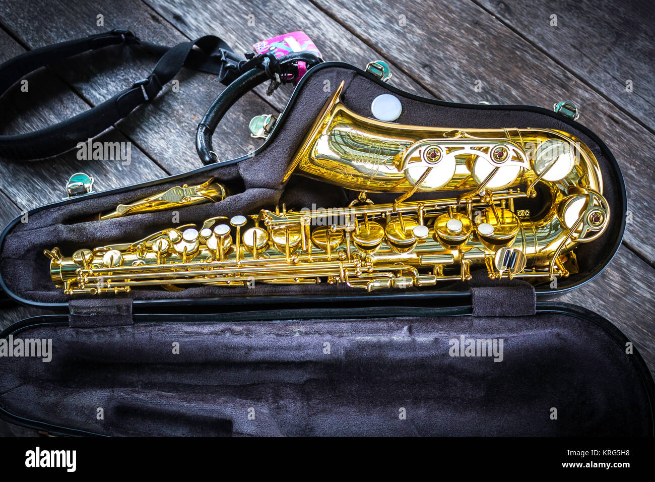 Golden alto saxophone in box Stock Photo - Alamy
