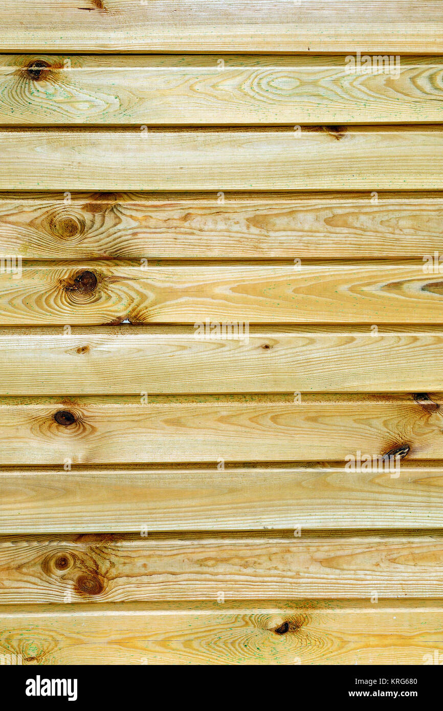 Closeup of a rustic wall built with natural wood planks Stock Photo - Alamy