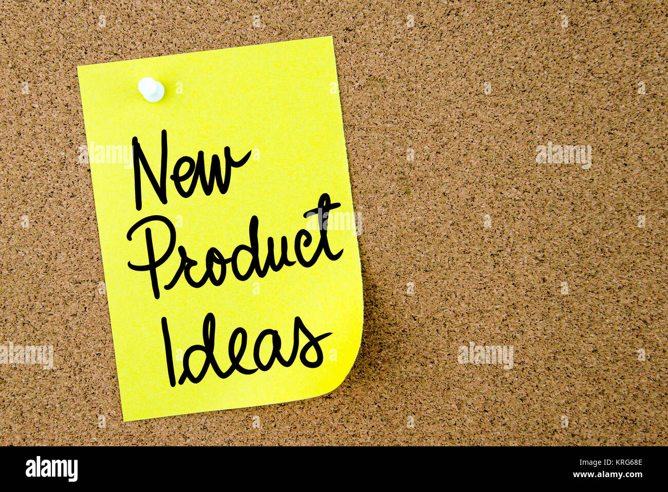 New Product Ideas text written on yellow paper note Stock Photo - Alamy