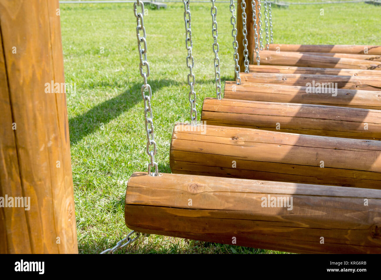 childrens bridge made of logs and chains Stock Photo - Alamy