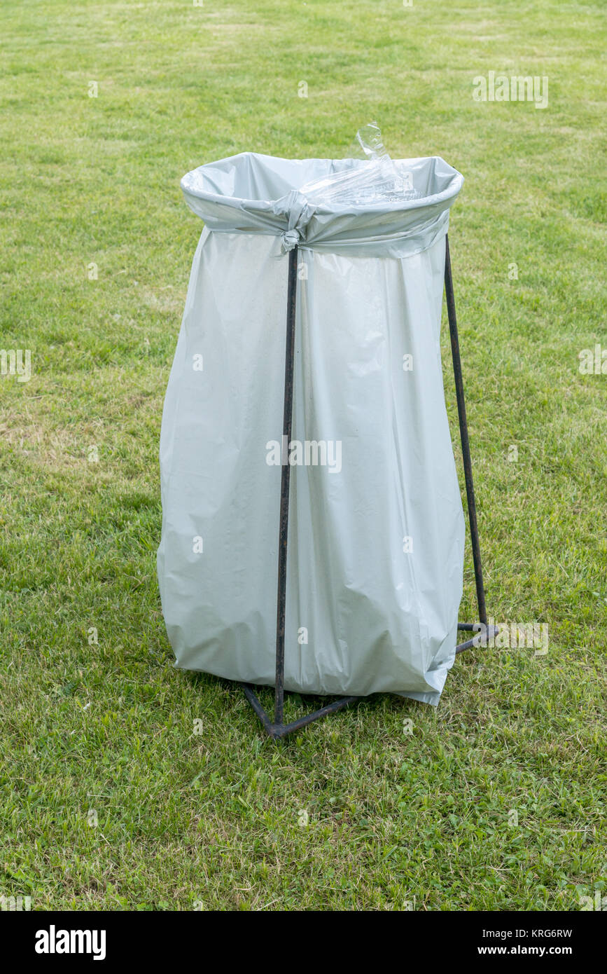 trashcan - a plastic garbage bag on an iron frame Stock Photo - Alamy