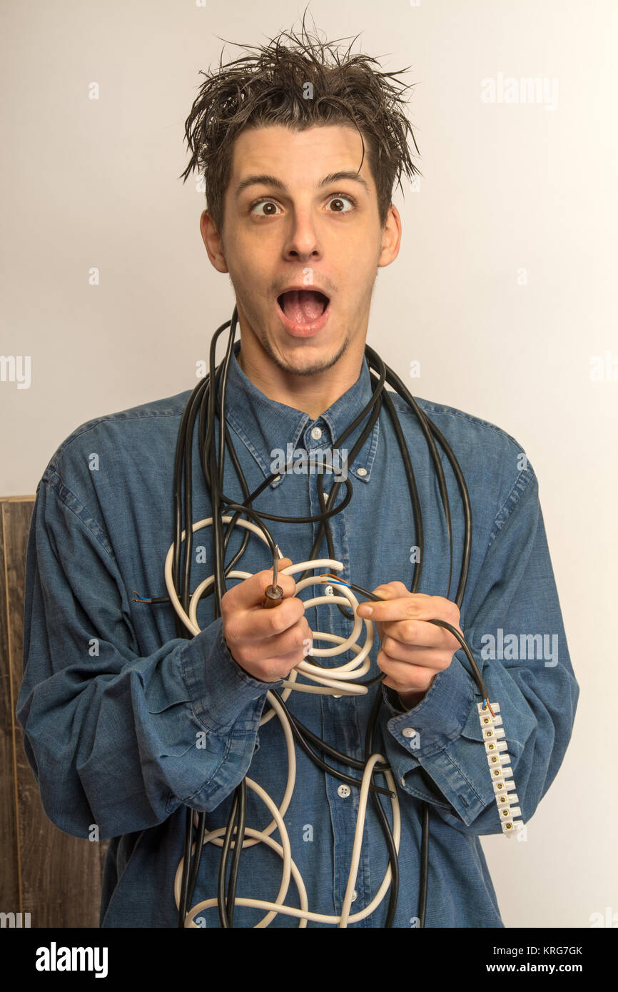 construction worker electrician trying to figure out what to do in a ...