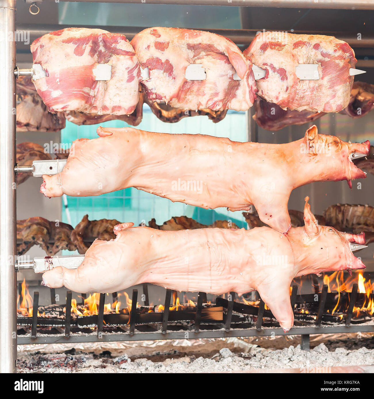 Carcasses of pork and other meat prepared on skewer Stock Photo - Alamy