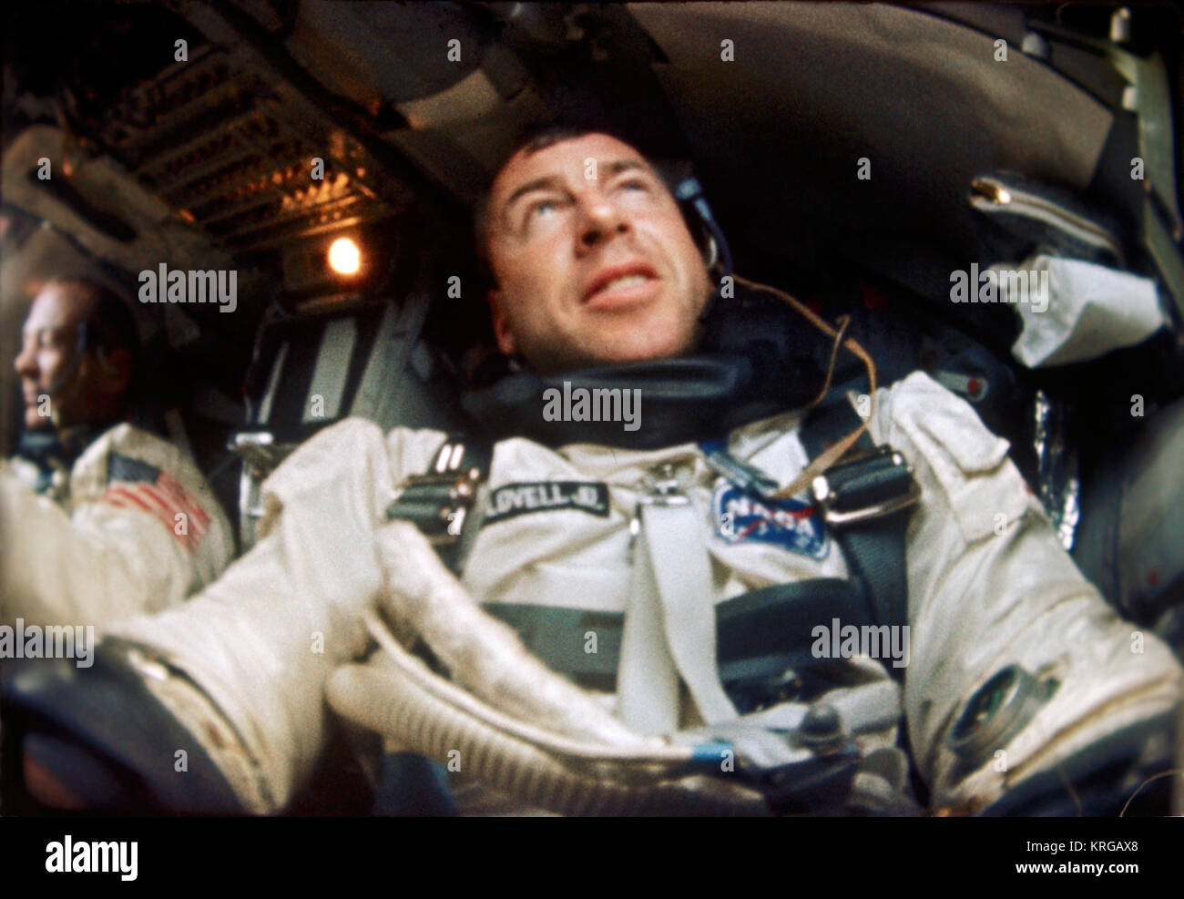 Astronaut James Lovell is photographed inside his Gemini spacecraft during the Gemini-12 mission ...