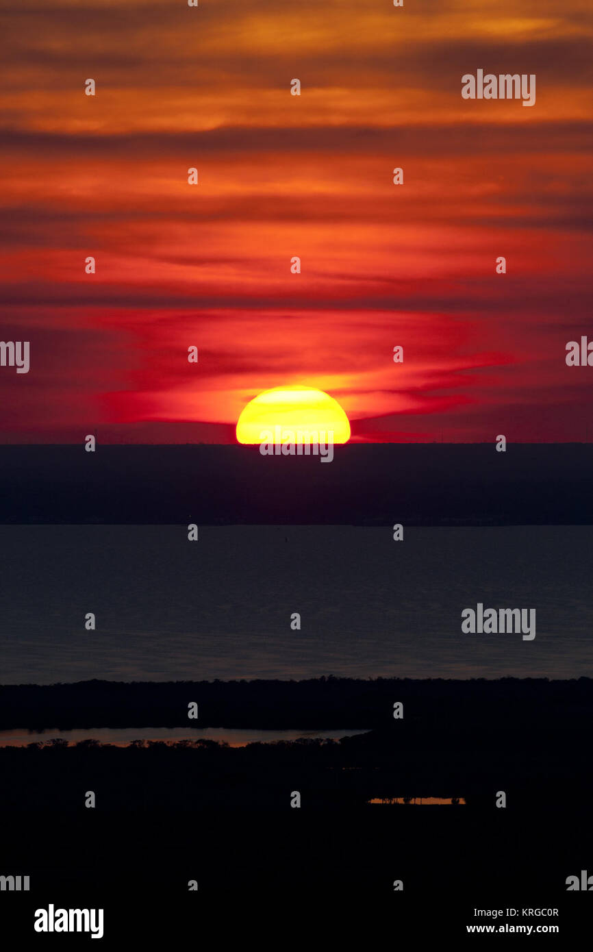 Vivid sunset at Kennedy Space Center during training for STS-133 Stock ...