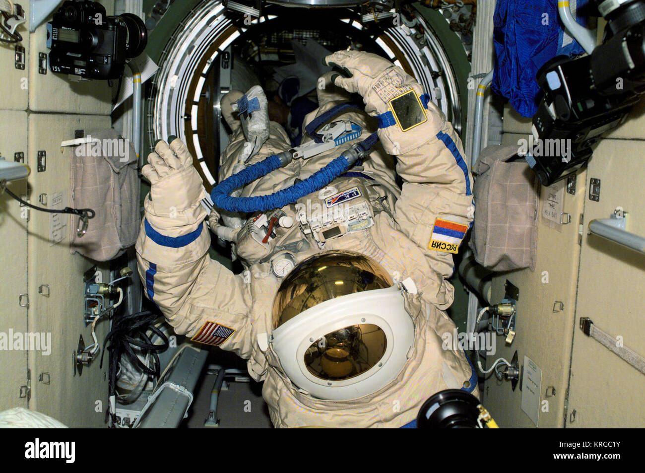 View of Russian Orlan space suits drifting in the Zarya module Stock ...