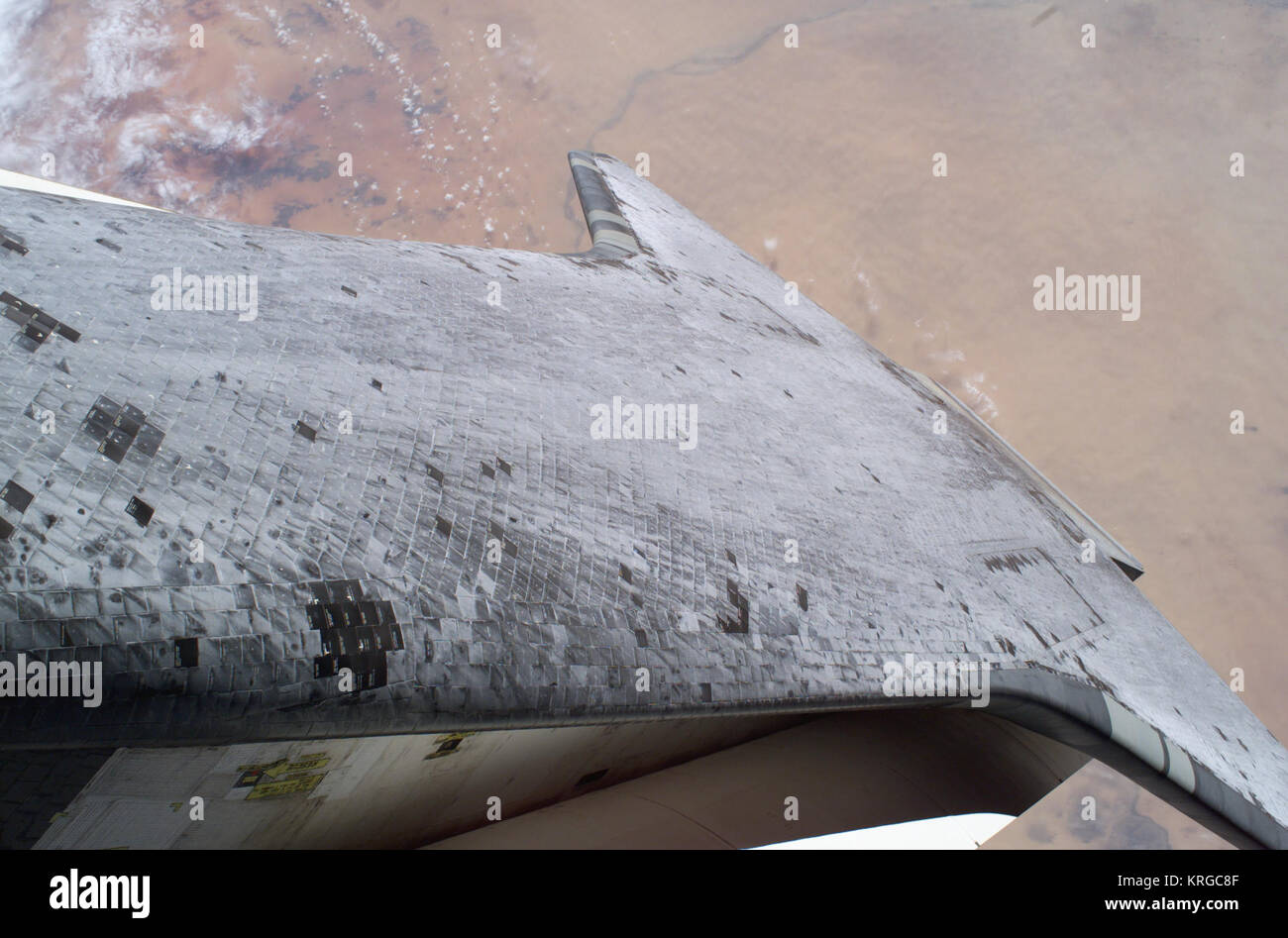 STS-114 Discovery underside Stock Photo - Alamy