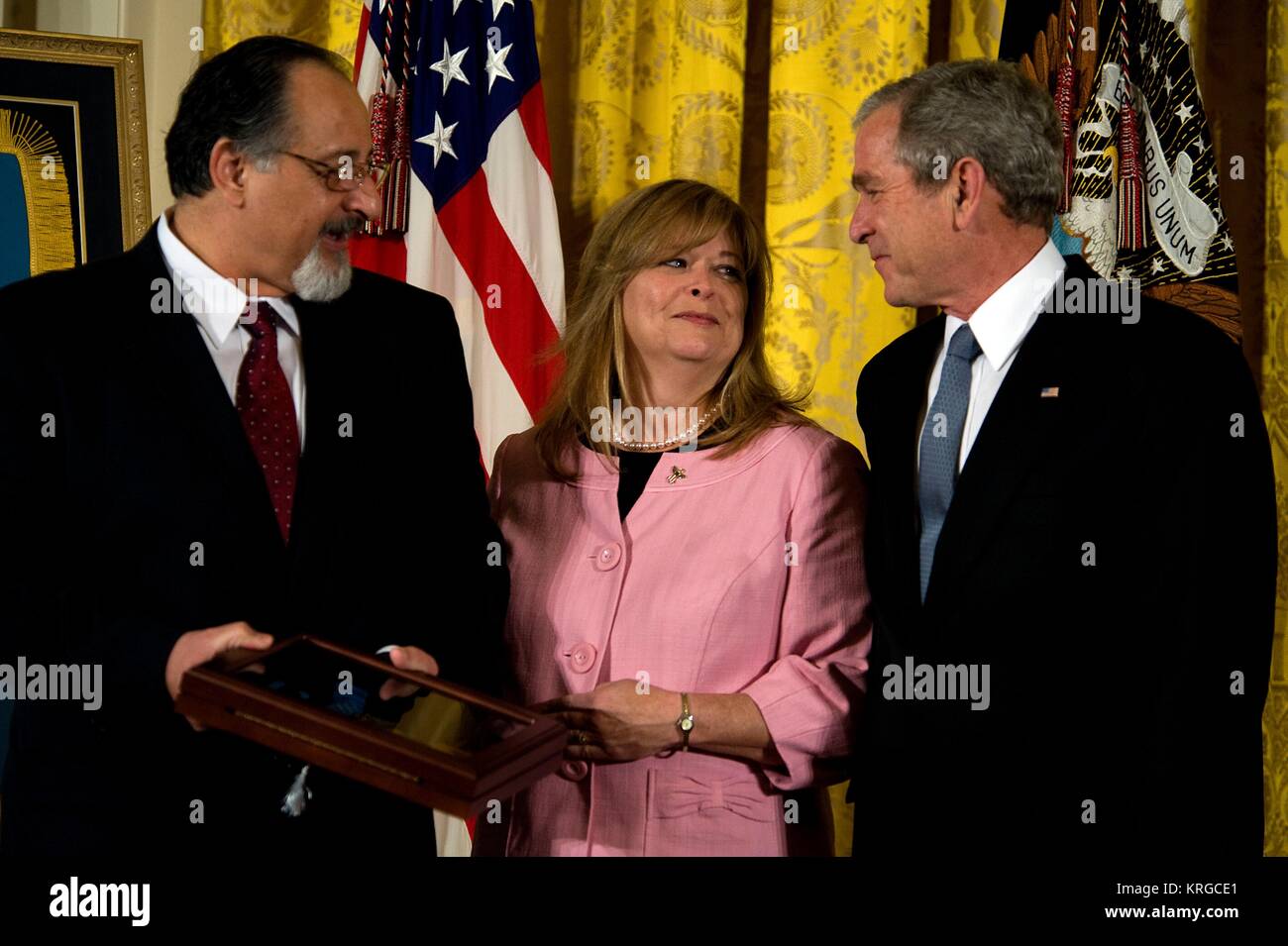 U.S. President George W. Bush awards George Monsoor and Sally Monsoor ...