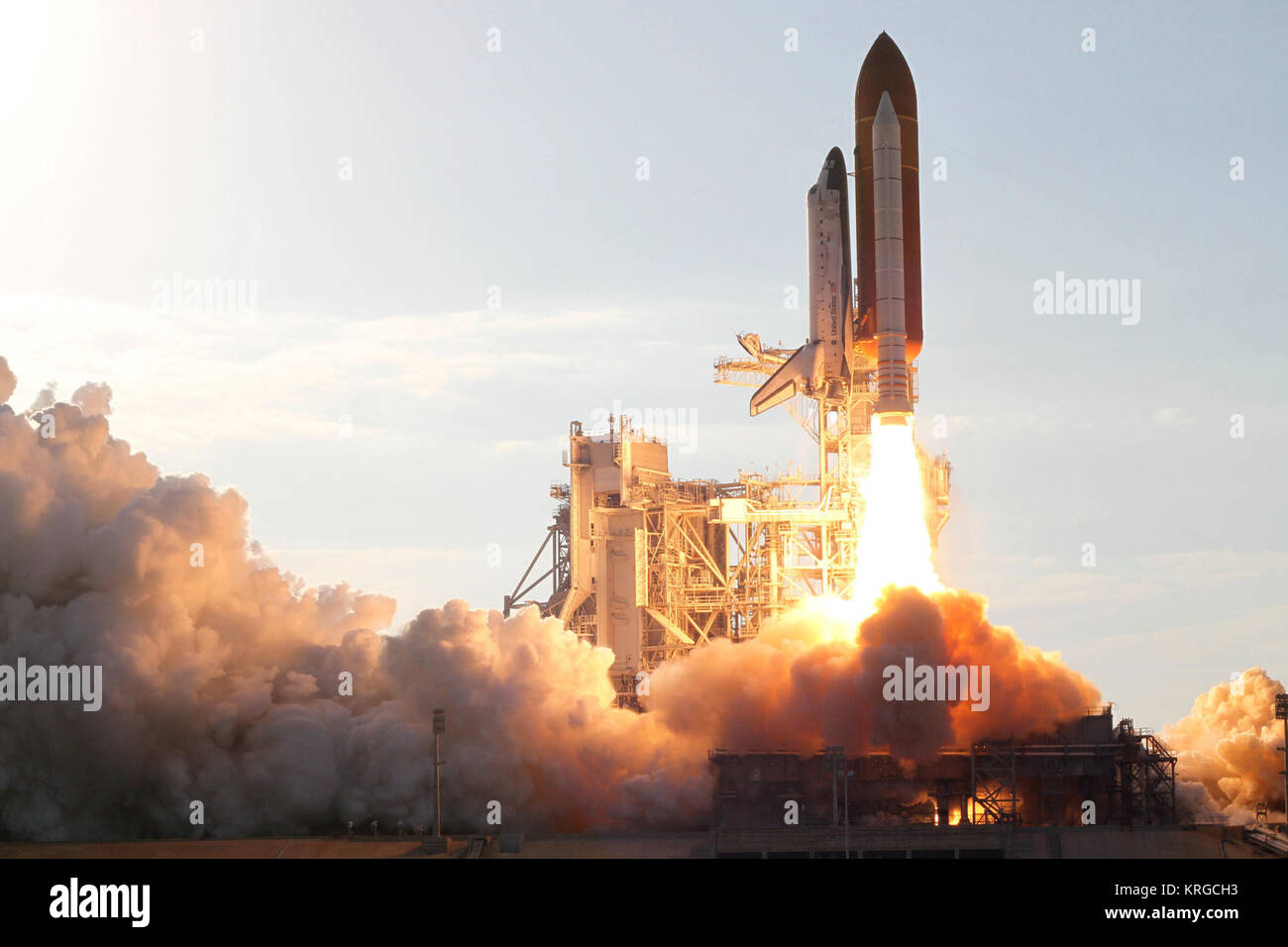 Space Shuttle Discovery lifting off on STS-133 Stock Photo - Alamy