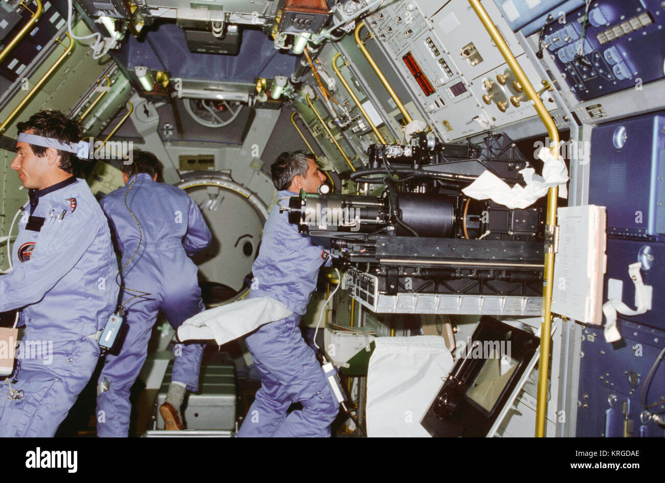 STS-9 crewmembers work in the Spacelab 1 module Stock Photo - Alamy