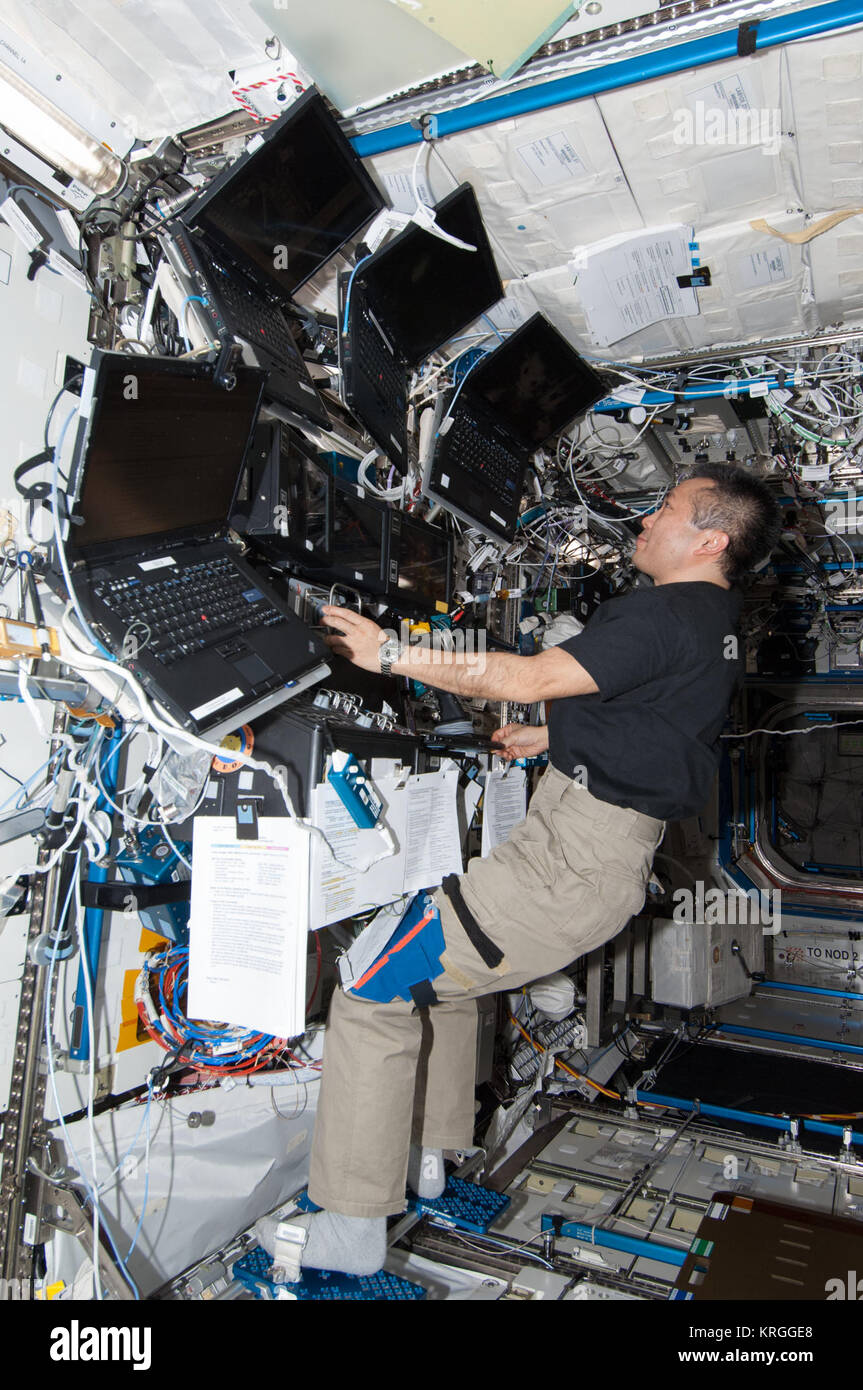 ISS-38 EVA-1 Koichi Wakata at the robotic workstation Stock Photo - Alamy
