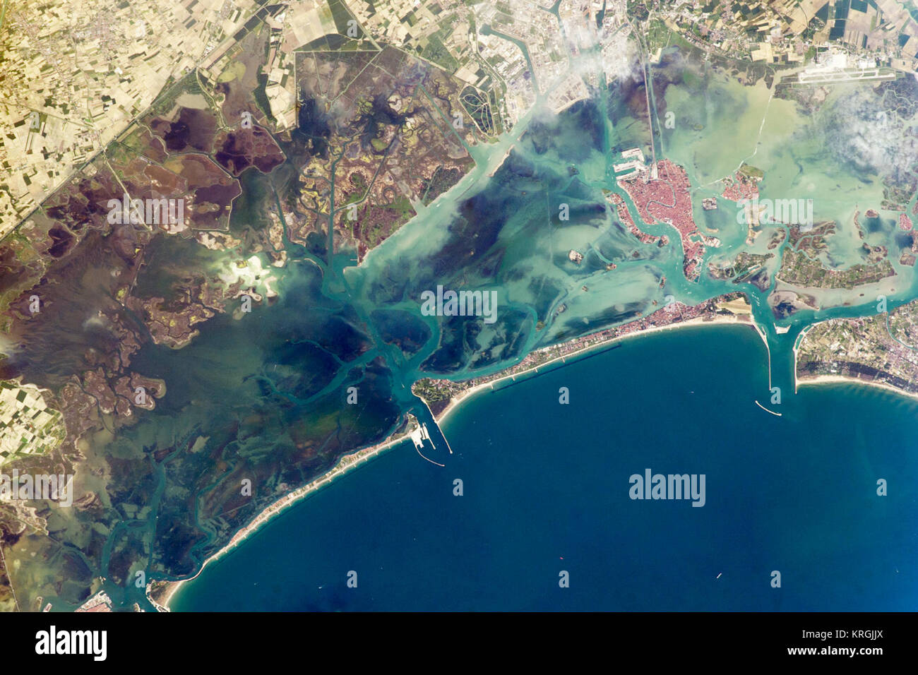 Venice Lagoon, Italy A narrow barrier island protects the Lagoon of ...