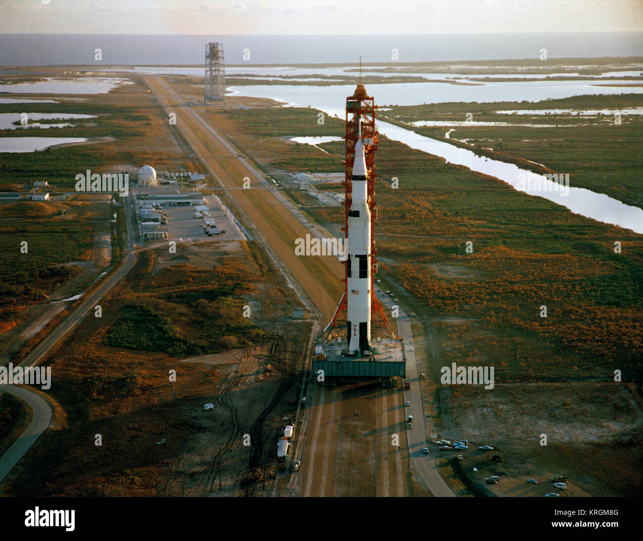 Aerial view of the Apollo 9 space vehicle on the way from the Vehicle ...