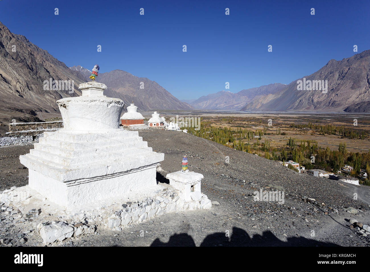 Stupas at the Turtuk monastery with a view of K2, Turtuk village in the ...