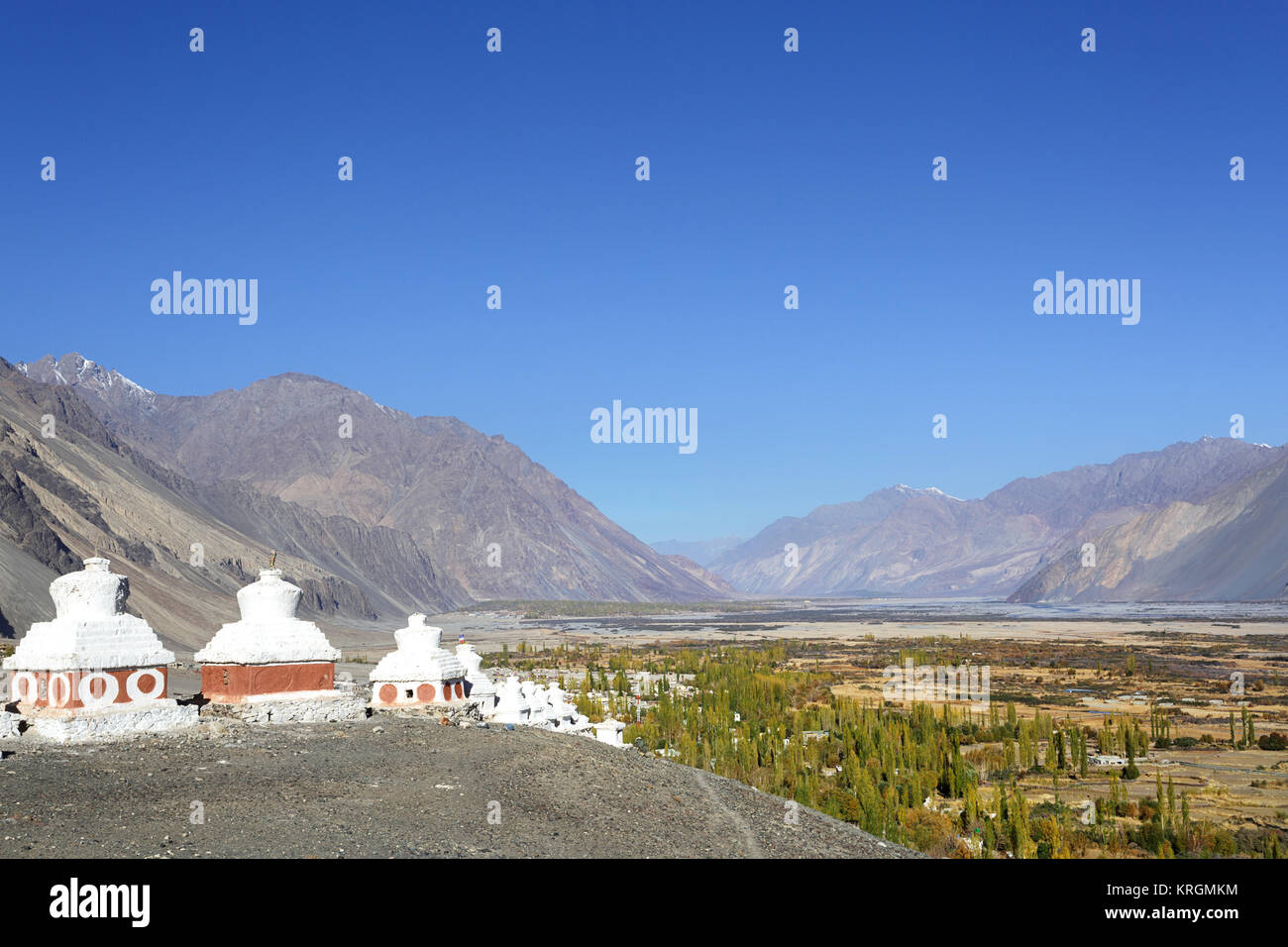 Stupas at the Turtuk monastery with a view of K2, Turtuk village in the ...