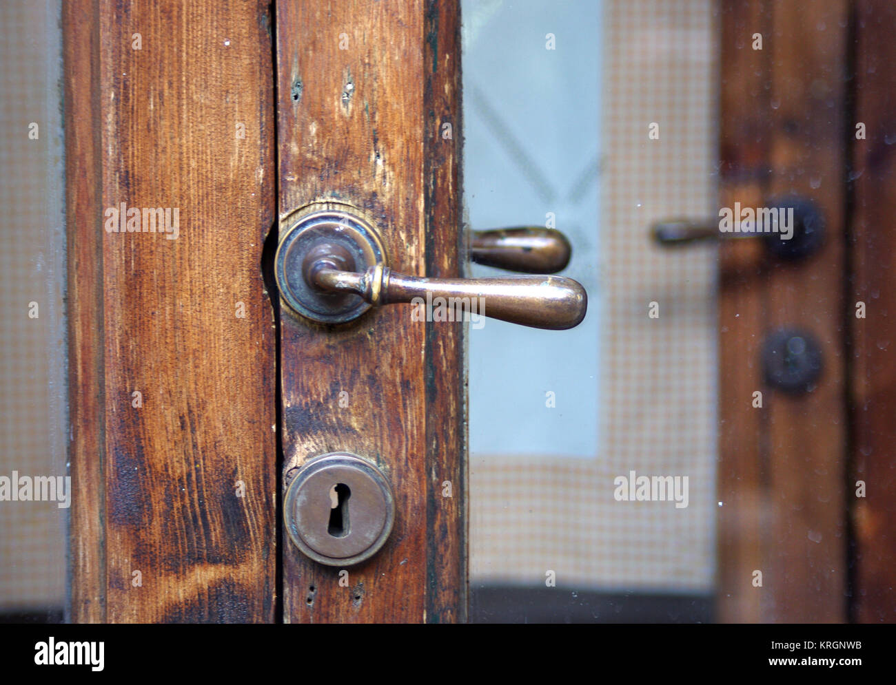 old wooden door with key lock Stock Photo - Alamy
