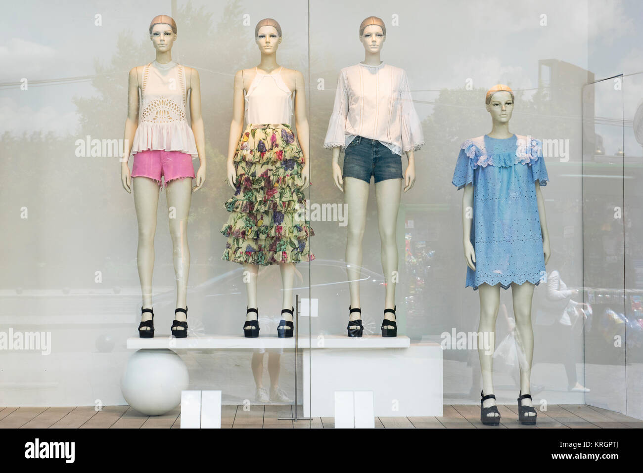 Clothing in a retail store Stock Photo - Alamy