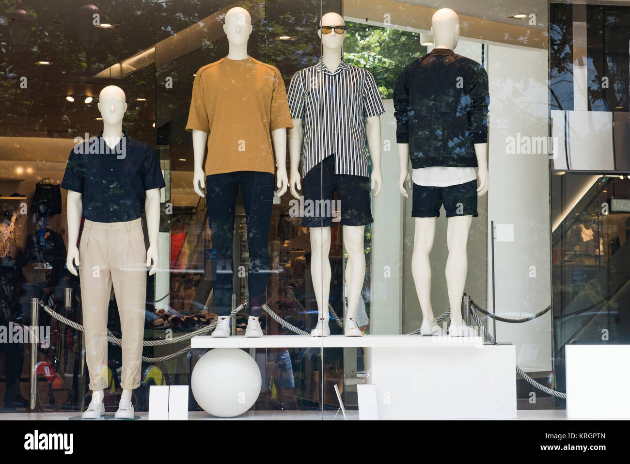 Reatil store with men clothing Stock Photo - Alamy