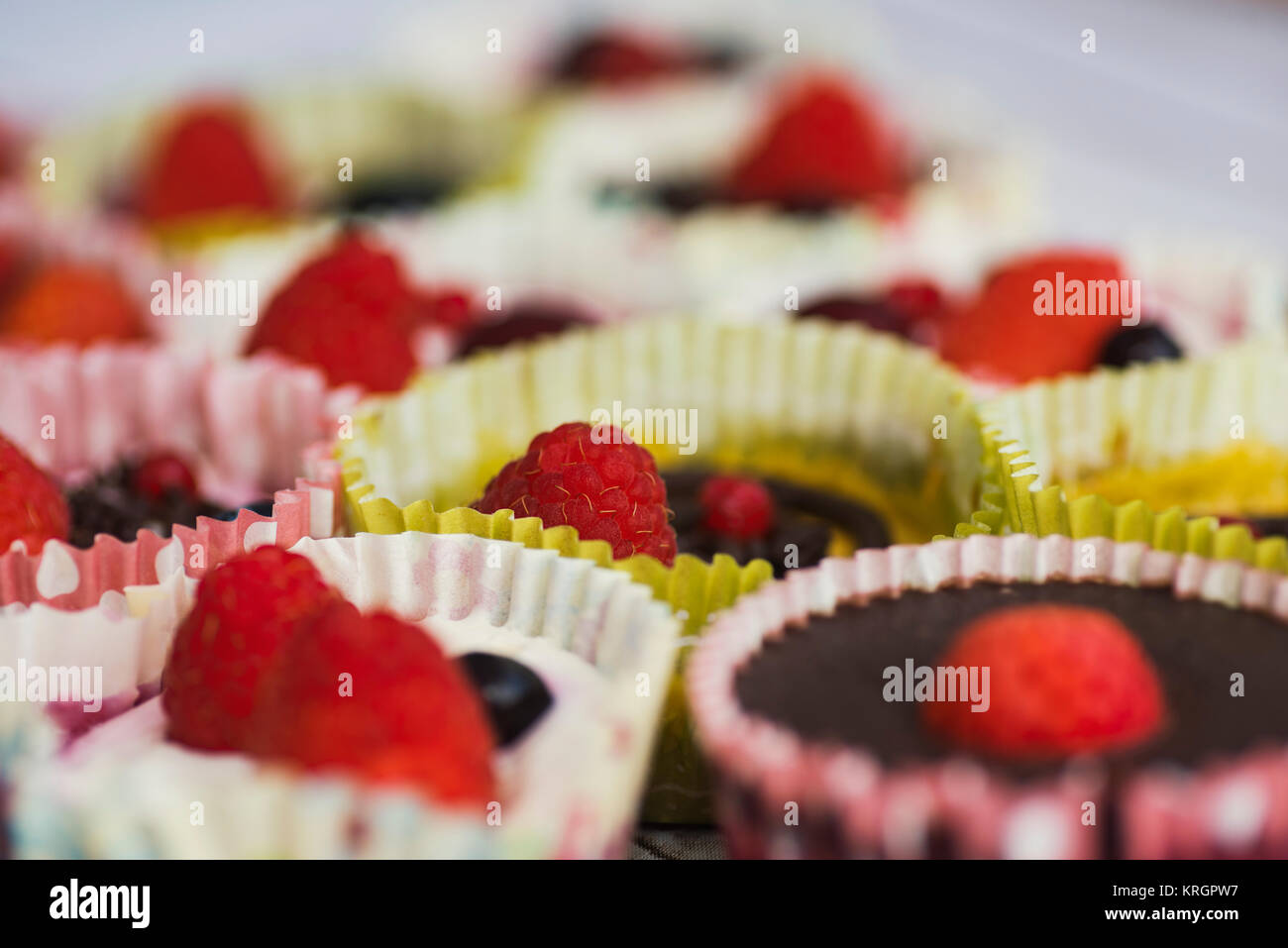 Colorful cupcakes with summer fruits in detail Stock Photo - Alamy