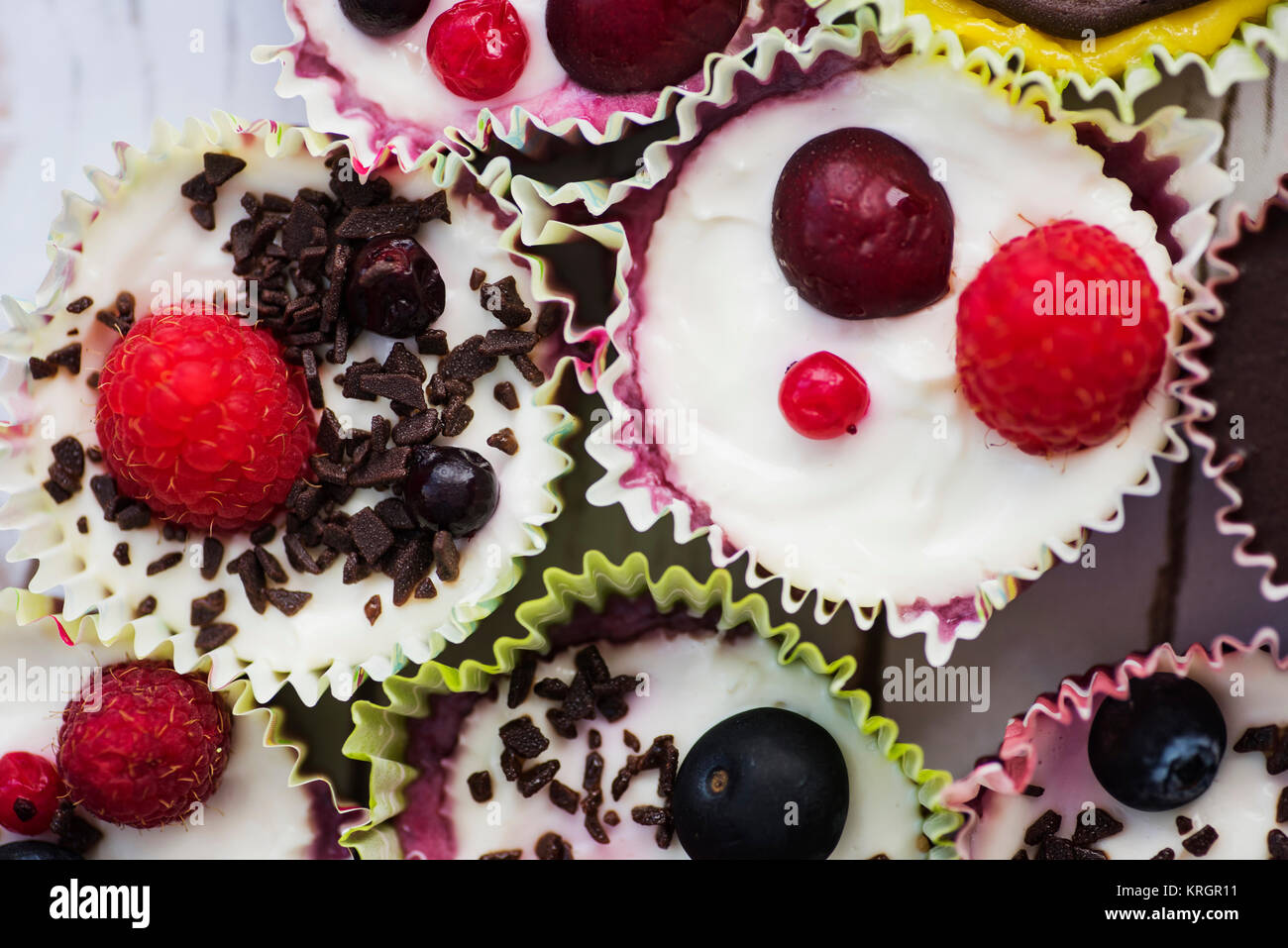 Colorful cupcakes with summer fruits in detail Stock Photo - Alamy