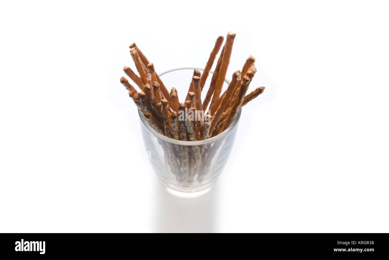 Salt sticks in glass on white background, isolated - Perspective from ...