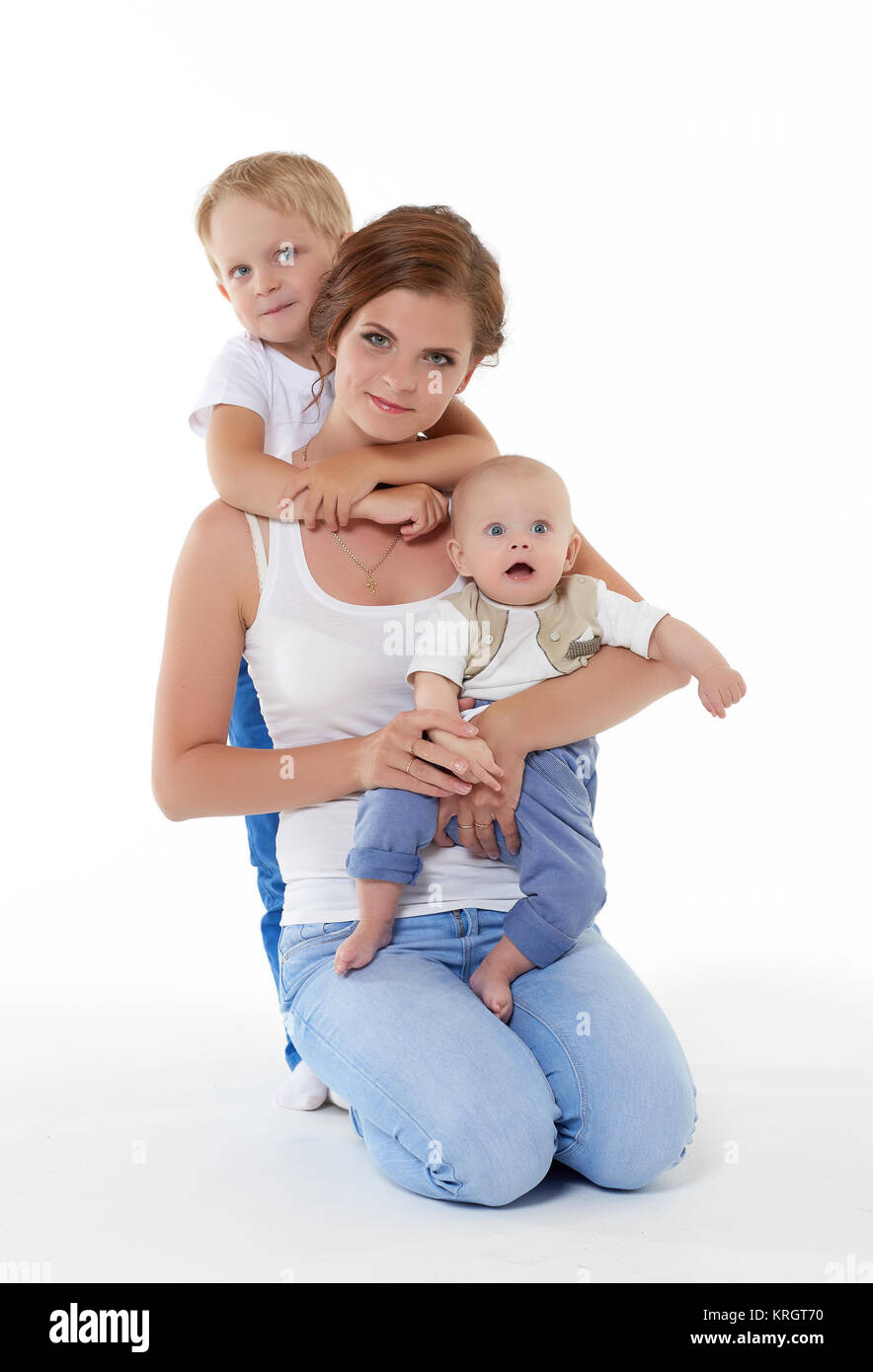 Happy mother with two babies Stock Photo - Alamy