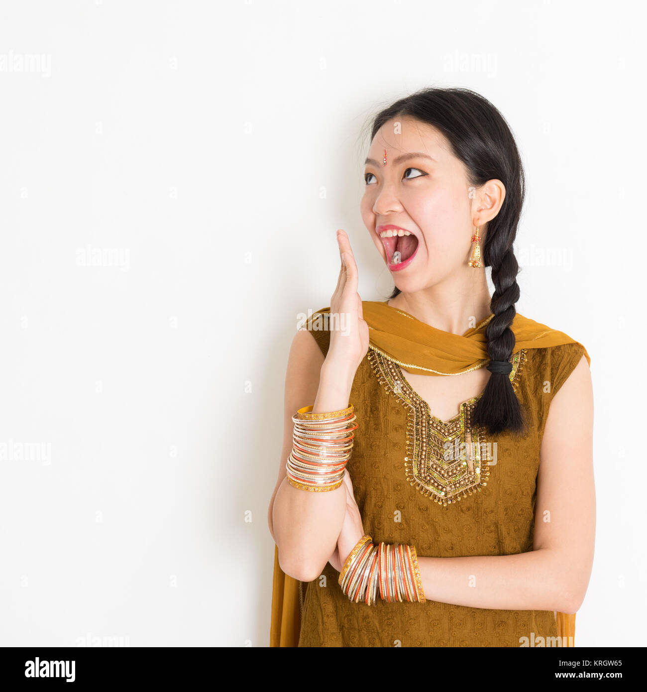 Mixed race Indian woman getting surprised Stock Photo - Alamy