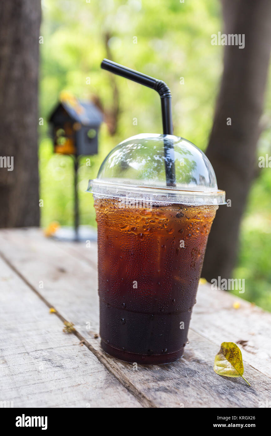 relax time with cold drink on wooden table lifestyle in nature Stock ...