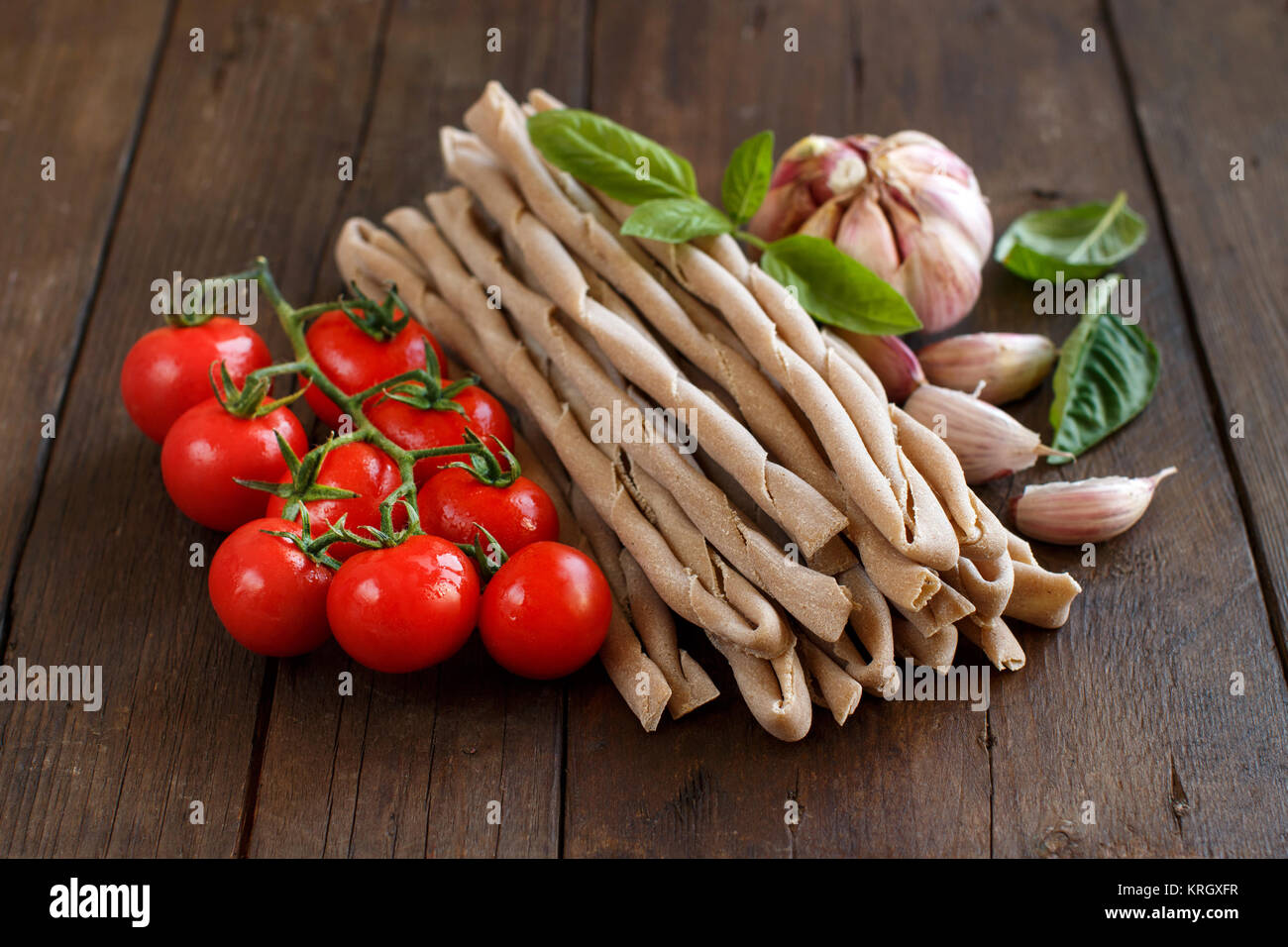 Whole wheat pasta, vegetables and herbs Stock Photo - Alamy