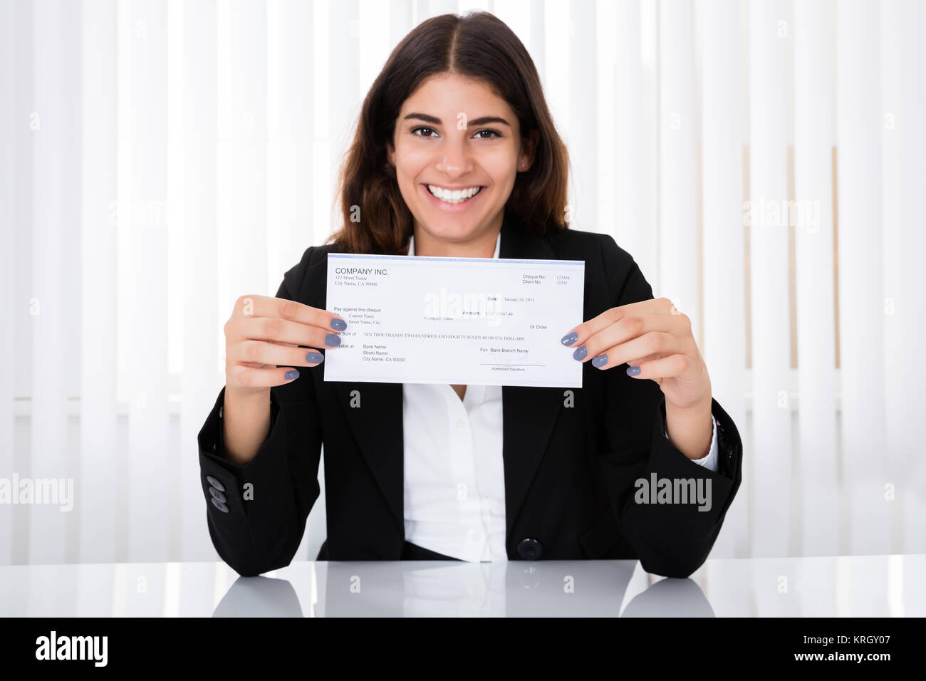 Cashier bank cheque hi-res stock photography and images - Alamy