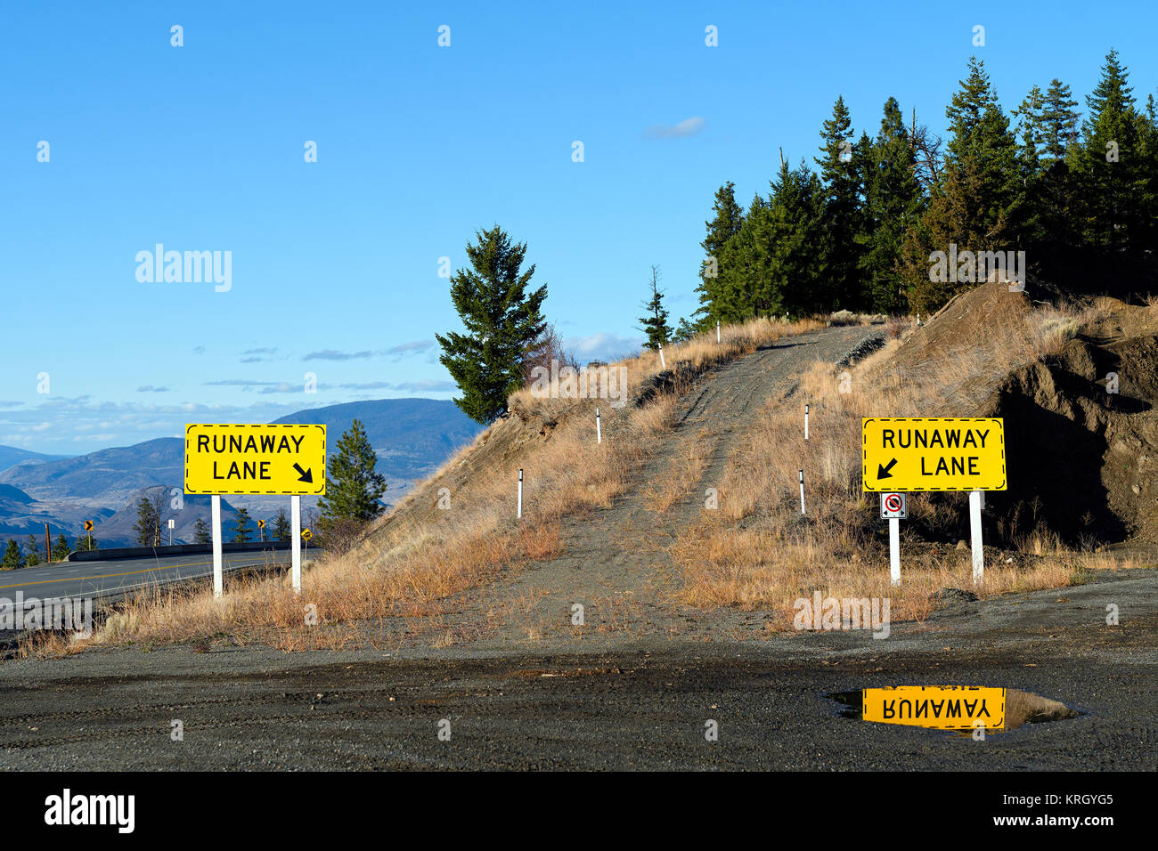 Road Sign for Runaway truck ramp in the forest on a mountain road ...