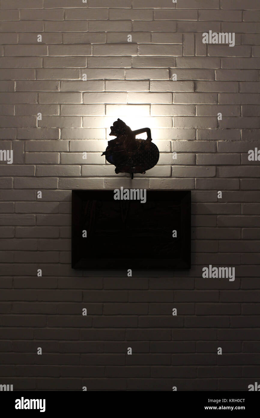 The silhouette of Javanese puppet, called "Wayang". The character is ...