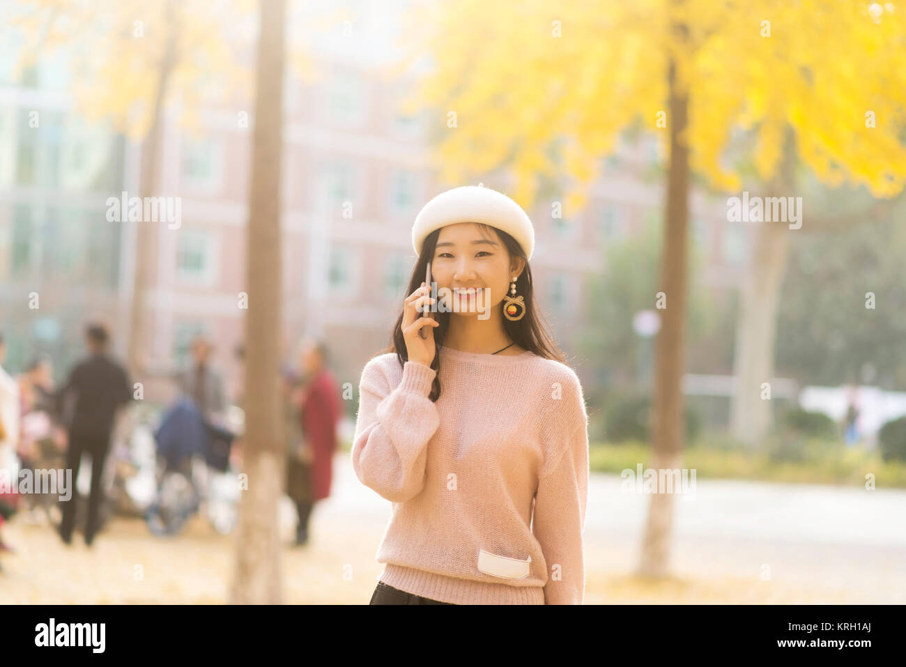 Teenage Girl Making Mobile Phone Call In Autumn Landscape Stock Photo ...
