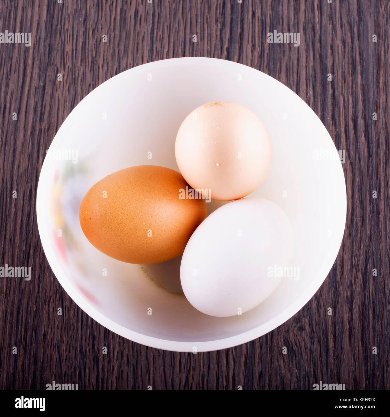 Eggs of three colors Stock Photo - Alamy