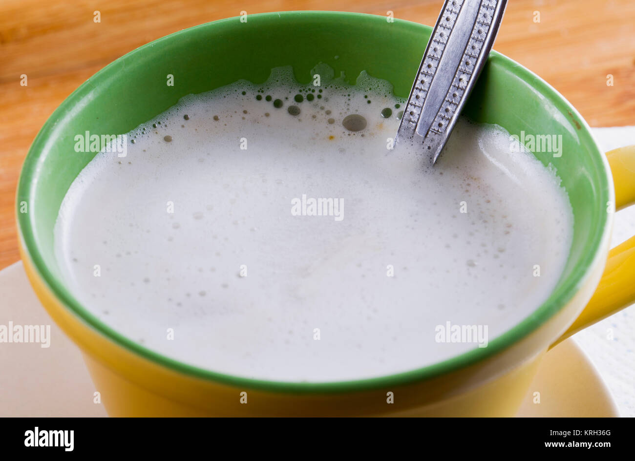 Milk cup in close up Stock Photo - Alamy