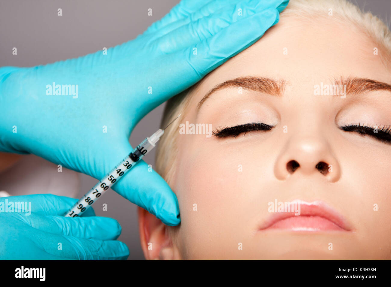 Cosmetic plastic surgeon injecting aesthetics face Stock Photo - Alamy