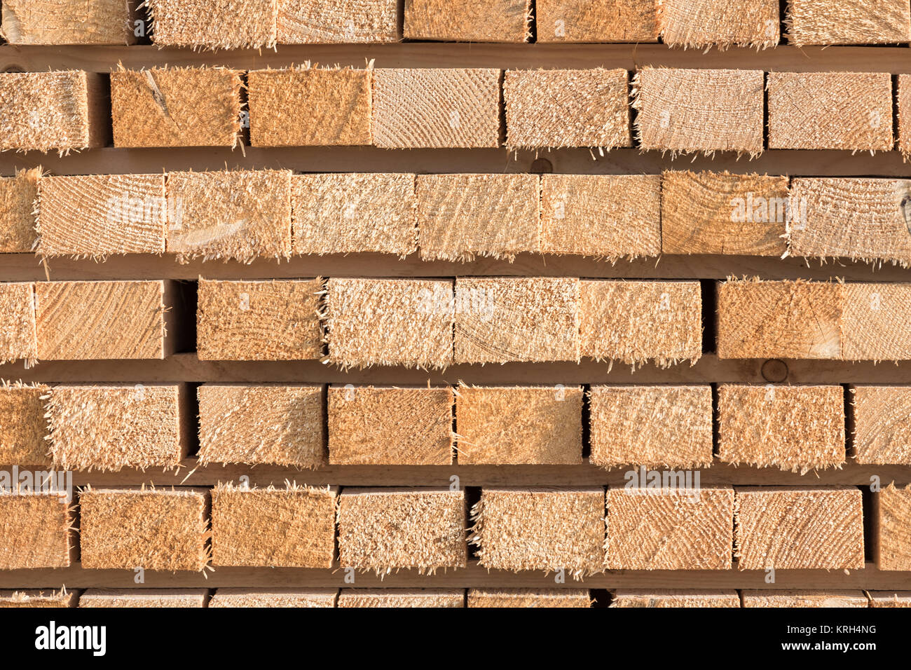 Stacked lumber background Stock Photo - Alamy