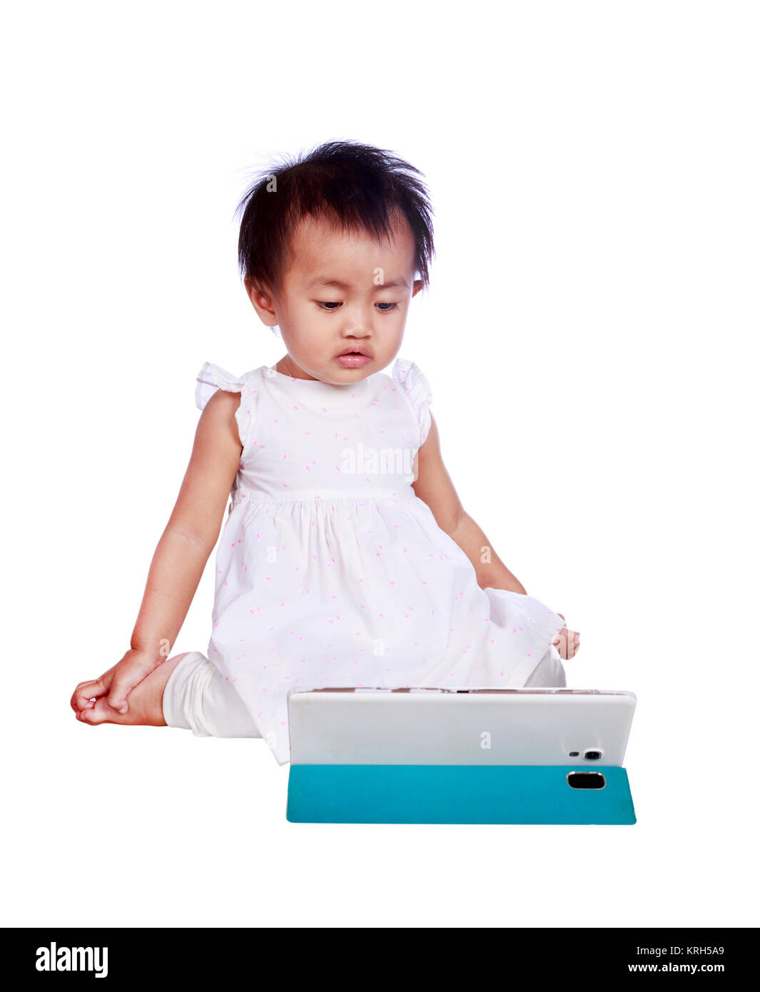 baby playing with digital tablet isolated on a white background Stock ...