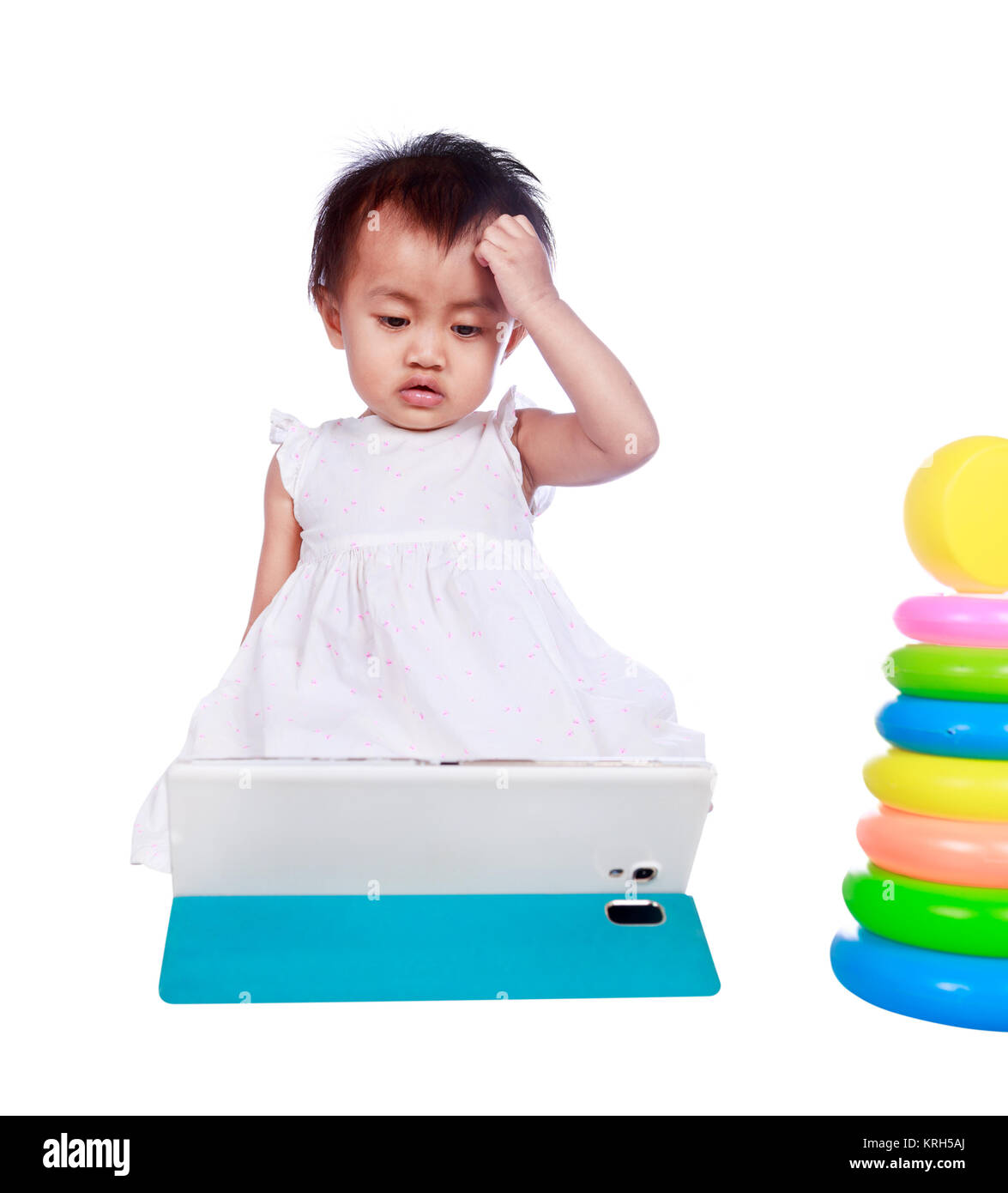 baby playing with digital tablet isolated on a white background Stock ...