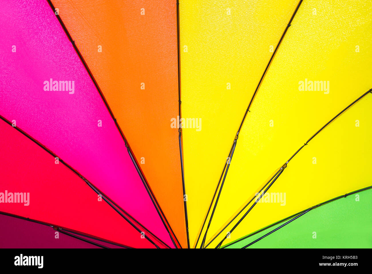 Rainbow colored summer umbrella pattern Stock Photo - Alamy