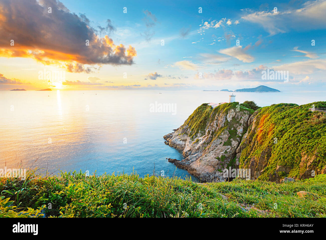 Hong Kong lighthouse during sunrise Stock Photo - Alamy