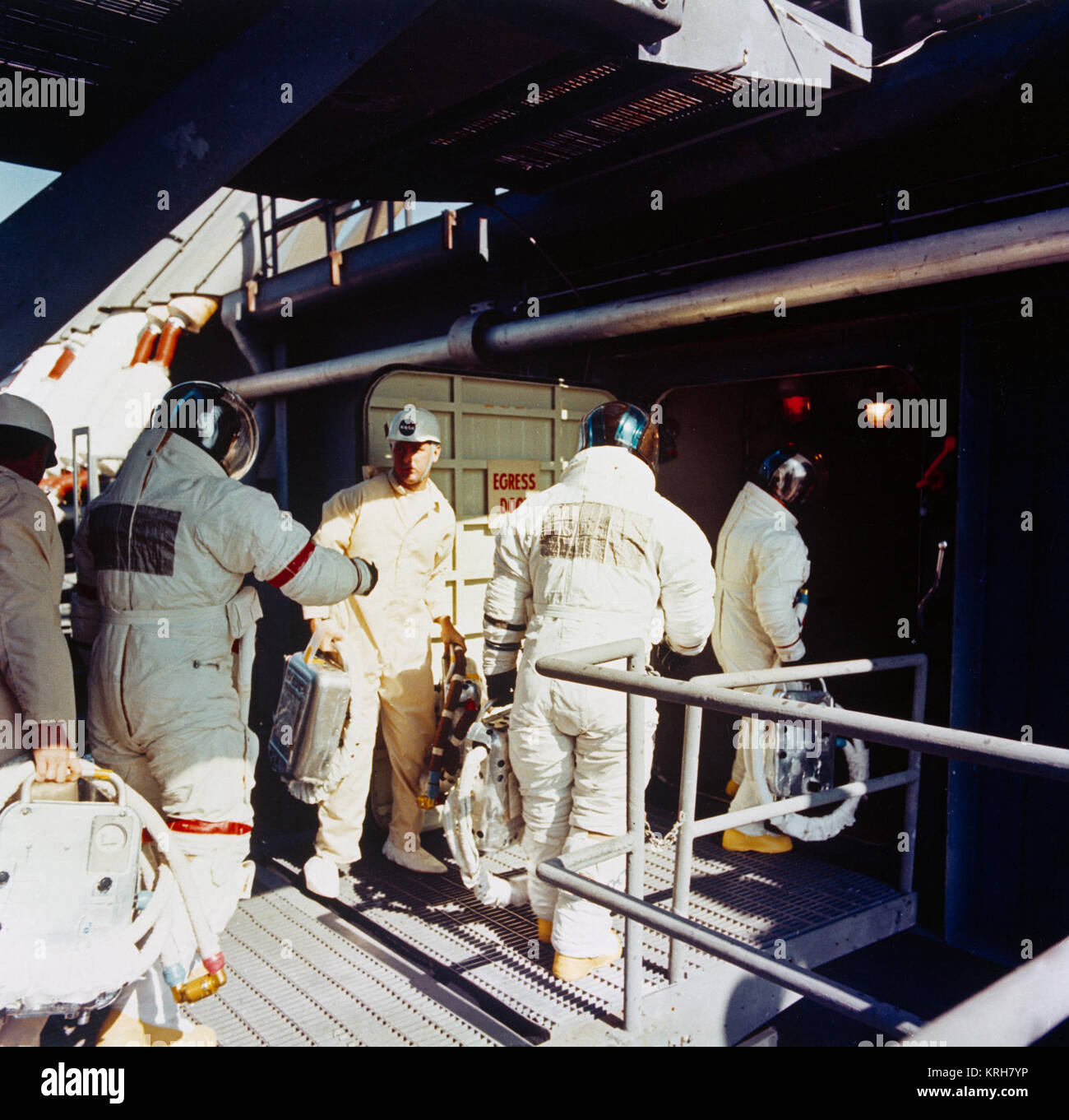 The three Apollo 14 astronauts arrive at the White Room atop Pad A ...