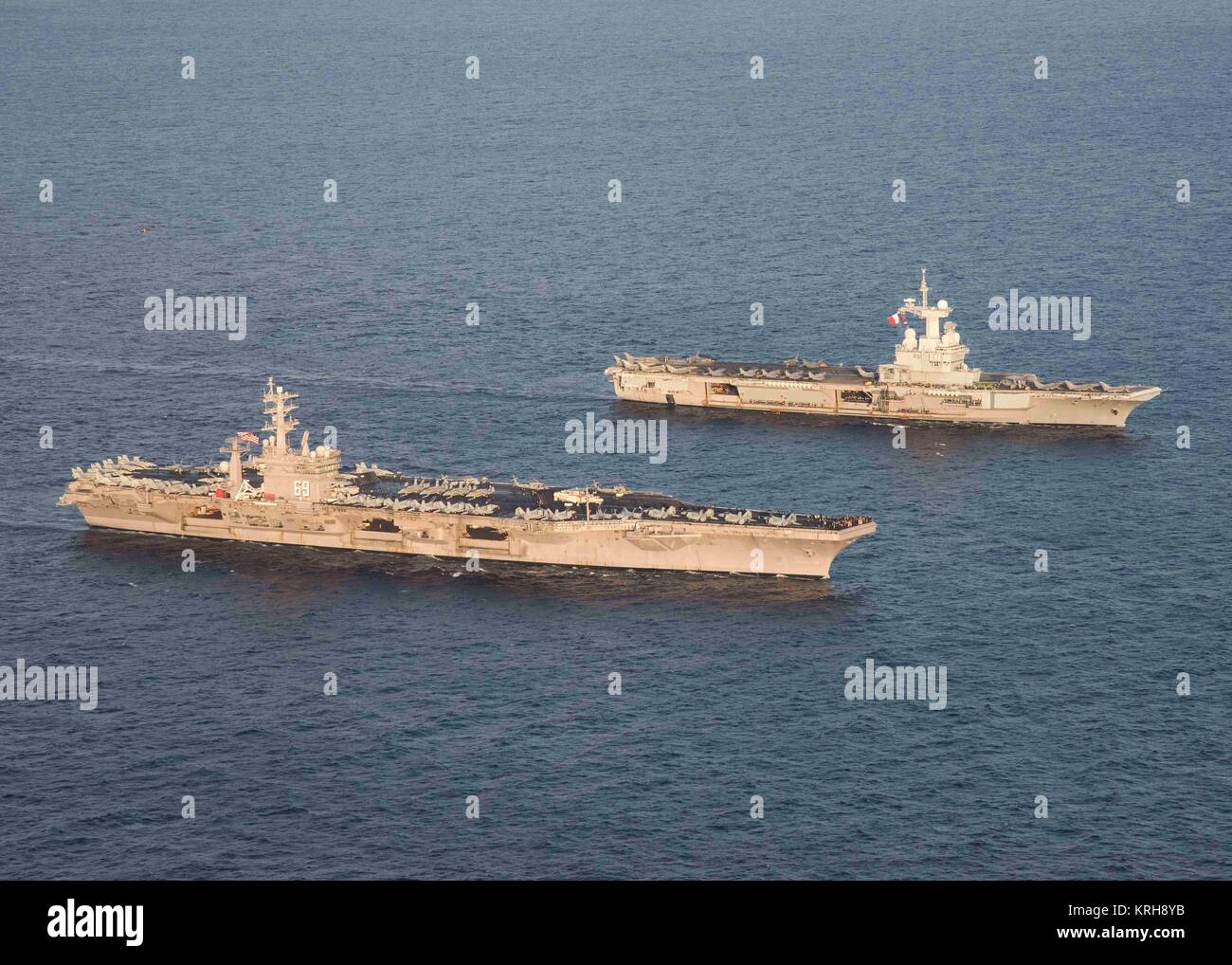 The USN Nimitz-class aircraft carrier USS Dwight D. Eisenhower (front ...