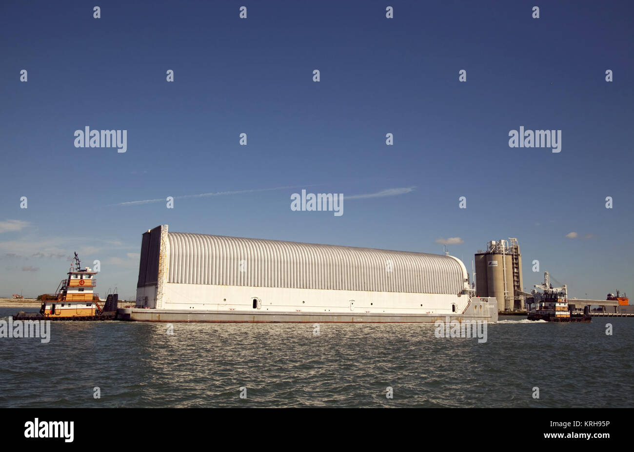 Tugs move the Pegasus barge through Port Canaveral (KSC-2011-7742 Stock ...