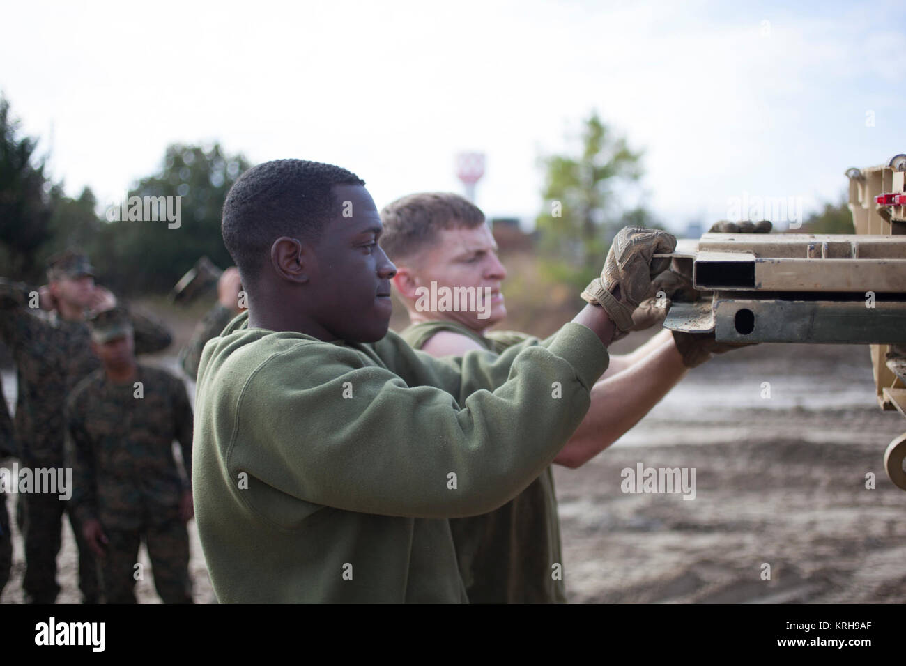 U.S. Marine Corps Lance Cpl. Grant B. Collins, left, with 2nd ...