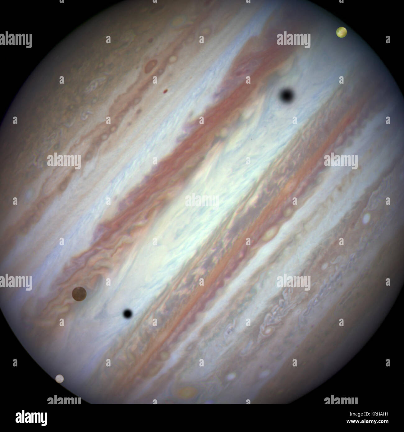 Hubble Captures Rare Triple-Moon Conjunction (16431707116 Stock Photo ...