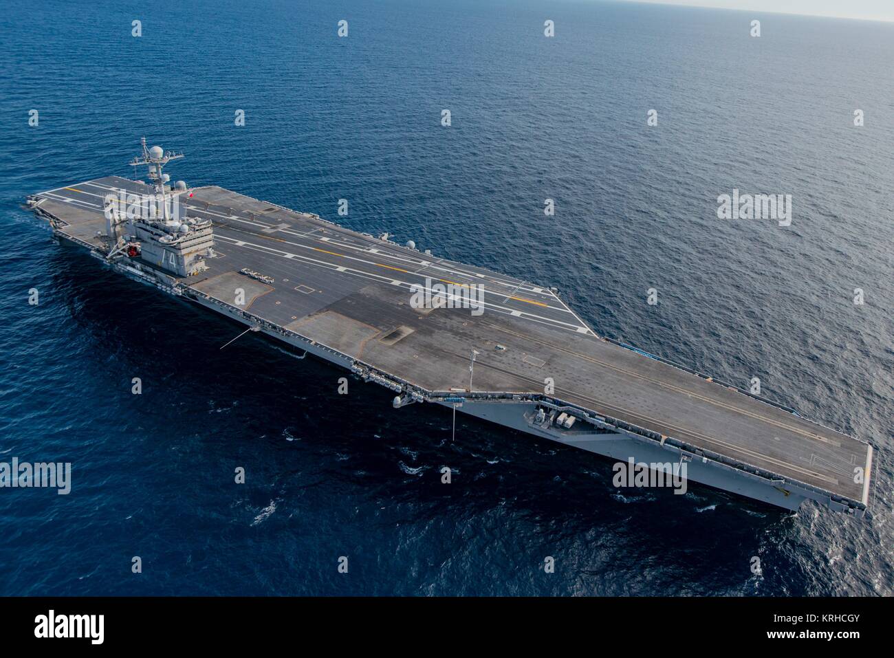 The USN Nimitz-class aircraft carrier USS John C. Stennis steams underway December 14, 2016 in ...