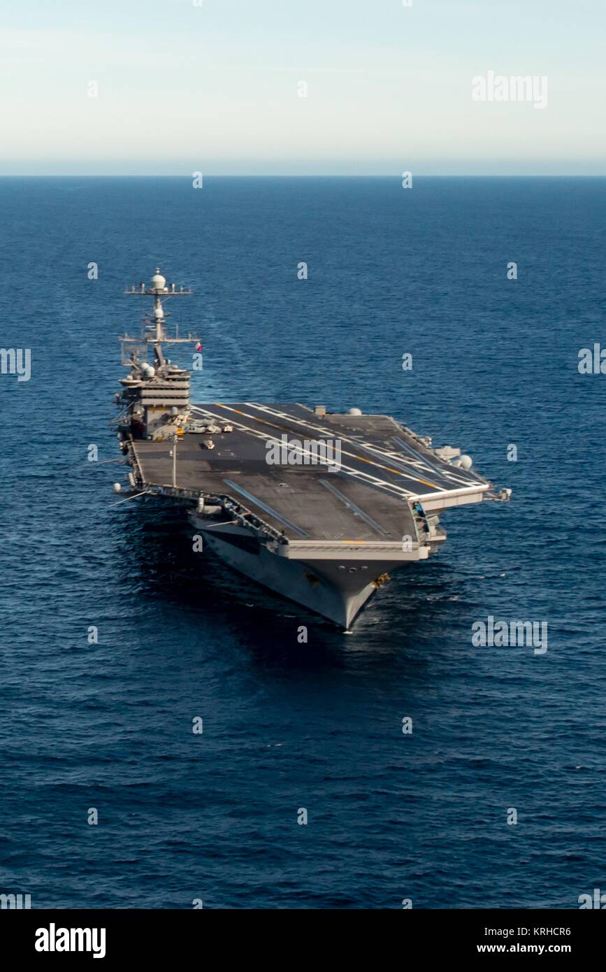 The USN Nimitz-class aircraft carrier USS John C. Stennis steams underway December 14, 2016 in ...
