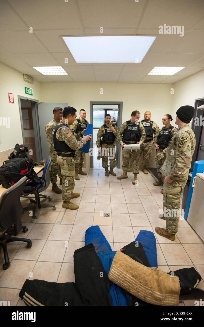 U.S. Soldiers, assigned to the Provost Marshall Office at U.S. Army ...