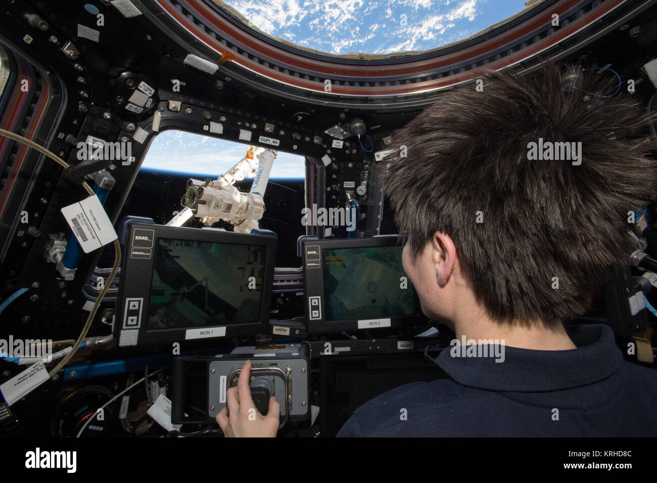 ISS-43 Samantha Cristoforetti guides the Canadarm2 from the Cupola ...
